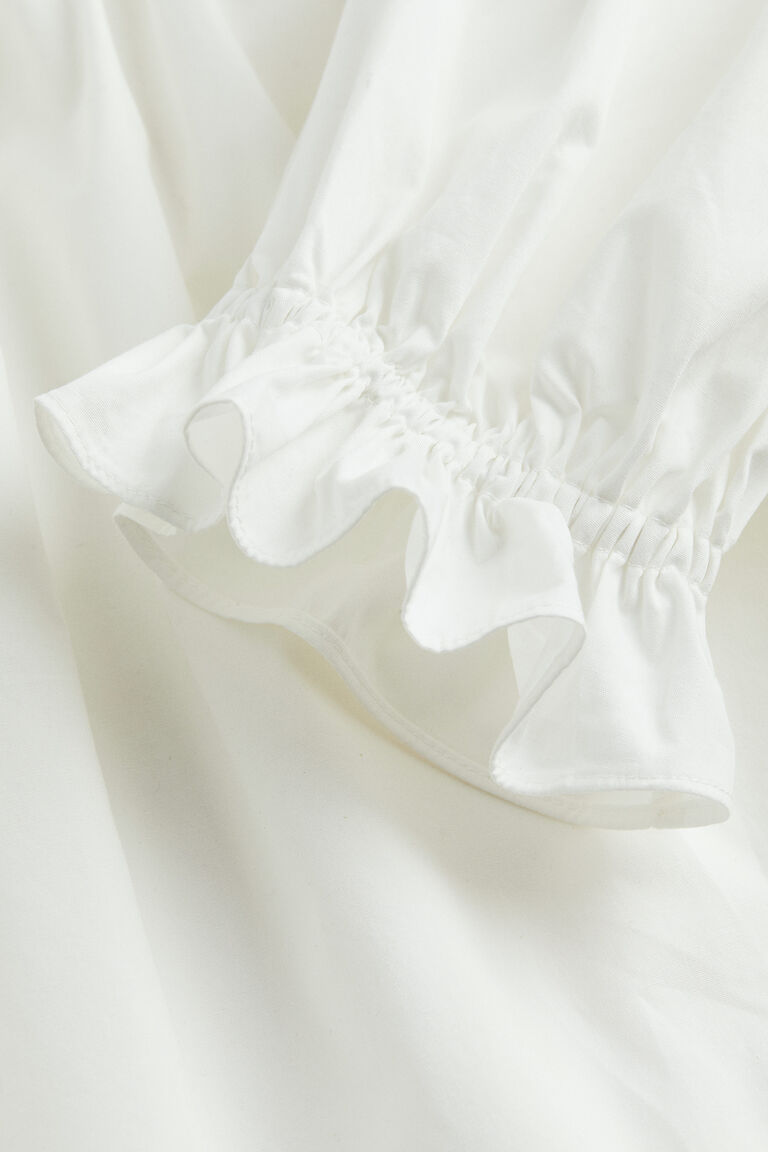 Frill-trimmed cotton blouse