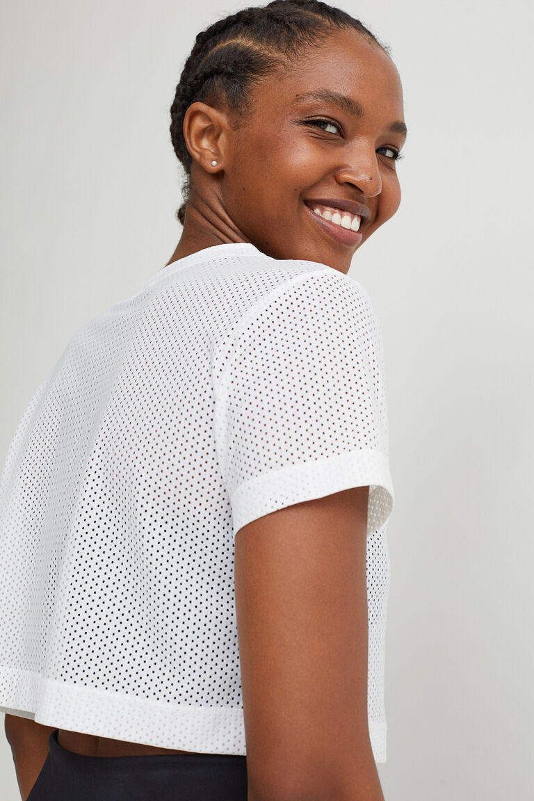 Cropped mesh sports top