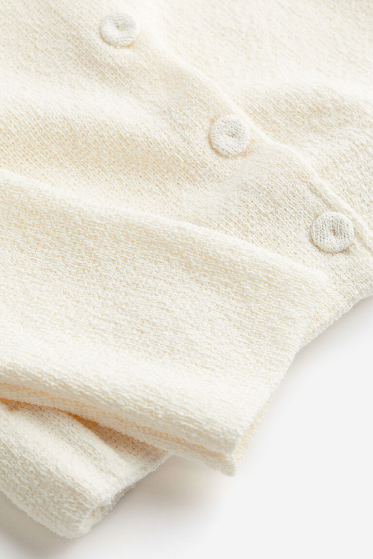 Knitted shoulder-pad jacket