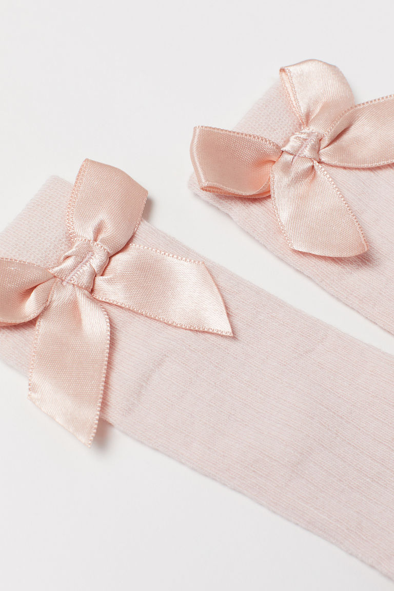 Knee socks with a bow