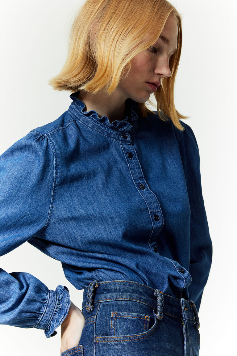 Frill-trimmed denim blouse