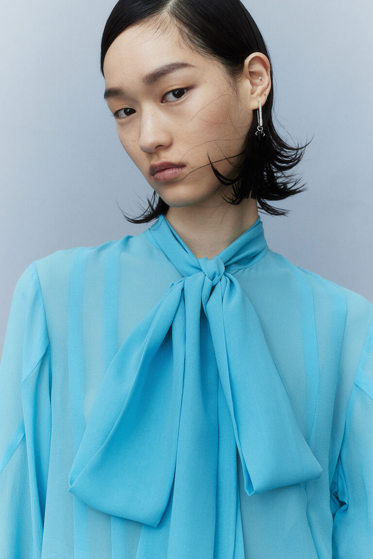 Sheer silk bow blouse