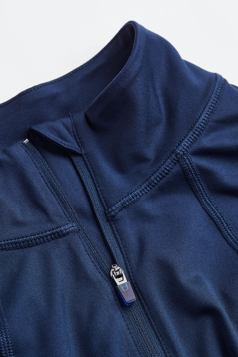Zip-top sports top in DryMove™