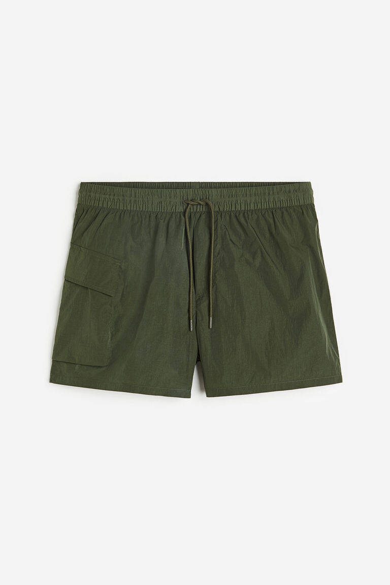 Leg-pocket swim shorts