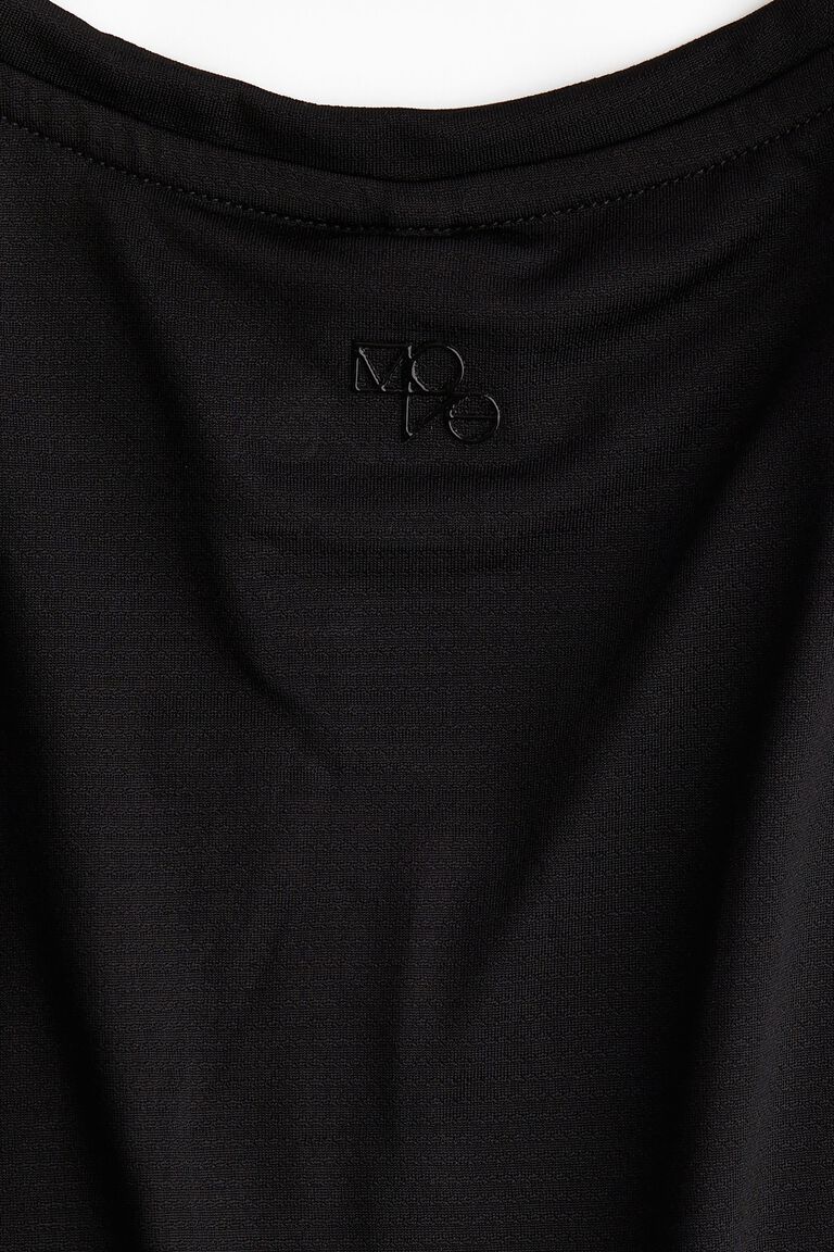 เสื้อกีฬาแขนกุดพร้อมเทคโนโลยี DryMove™ ซื้อชุดออกำลังกายผู้หญิง ออนไลน์ ...