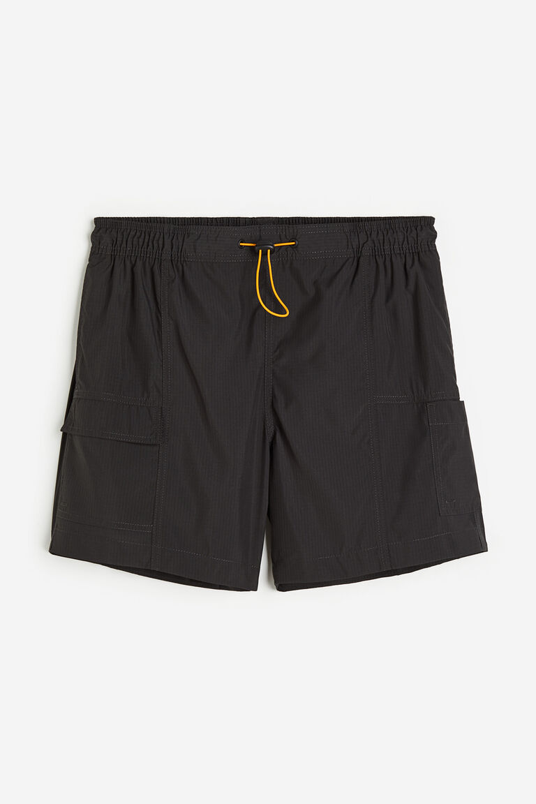 Leg-pocket swim shorts