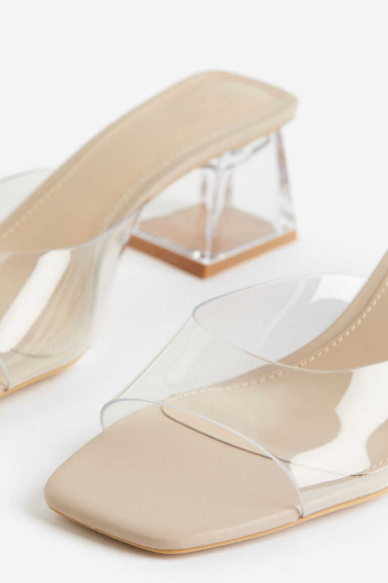 Transparent heeled mules