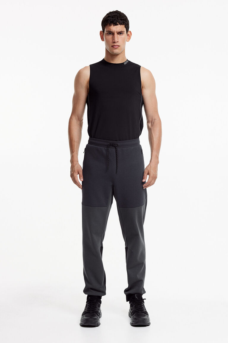 DryMove™ Tapered tech joggers with zipped pockets