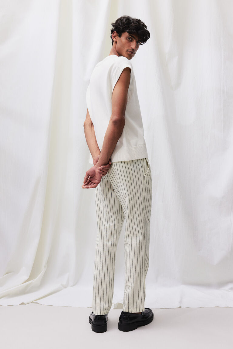 ซื้อ Regular Fit Linen-blend trousers ออนไลน์ สำหรับผู้ชาย | H&M Thailand