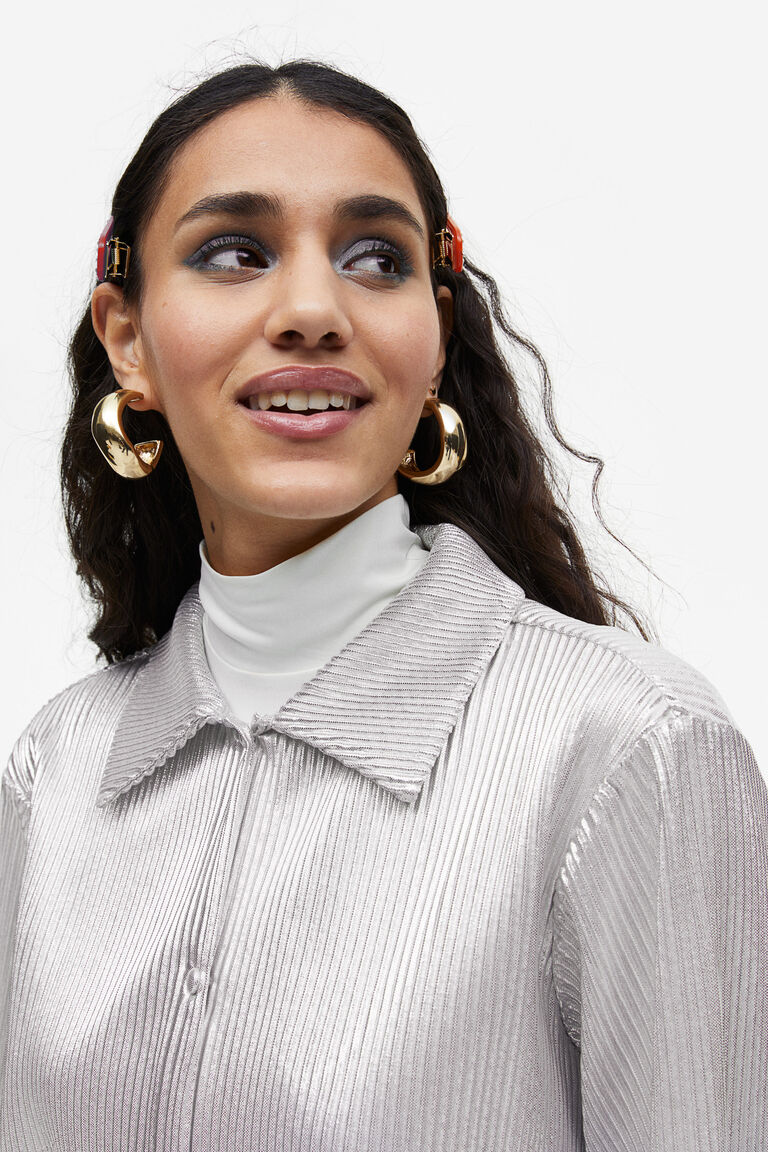 Shimmering metallic pleated shirt