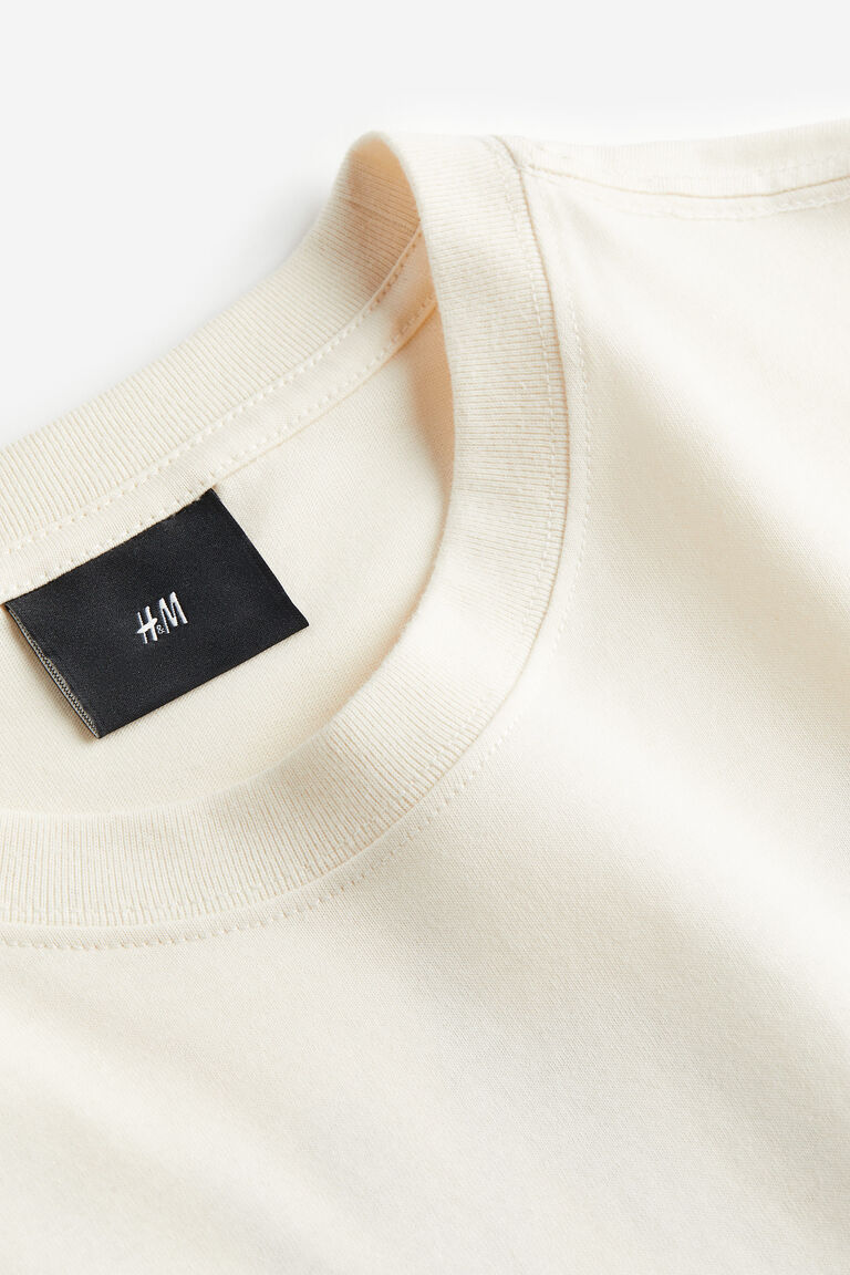 เสื้อยืดพิมพ์ลายทรงหลวม