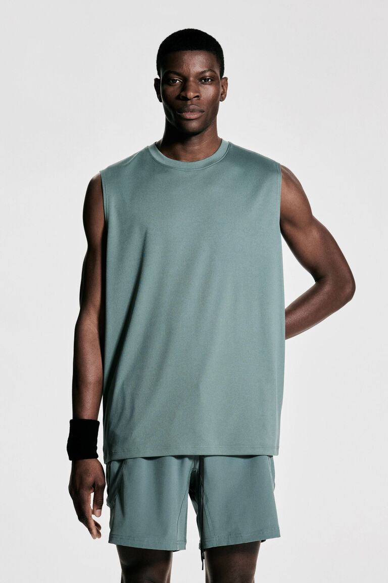 ซื้อ เสื้อกล้ามกีฬาผ้า DryMove™ ออนไลน์ สำหรับผู้ชาย | H&M Thailand