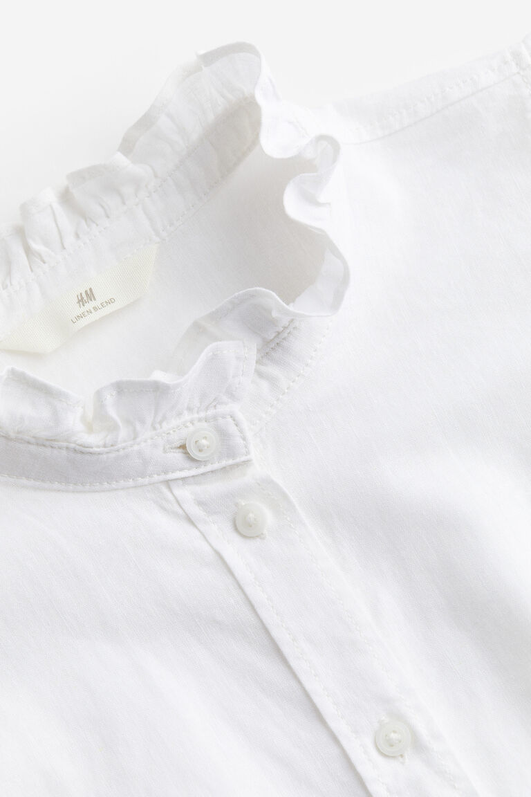 Linen-blend frill-trimmed blouse