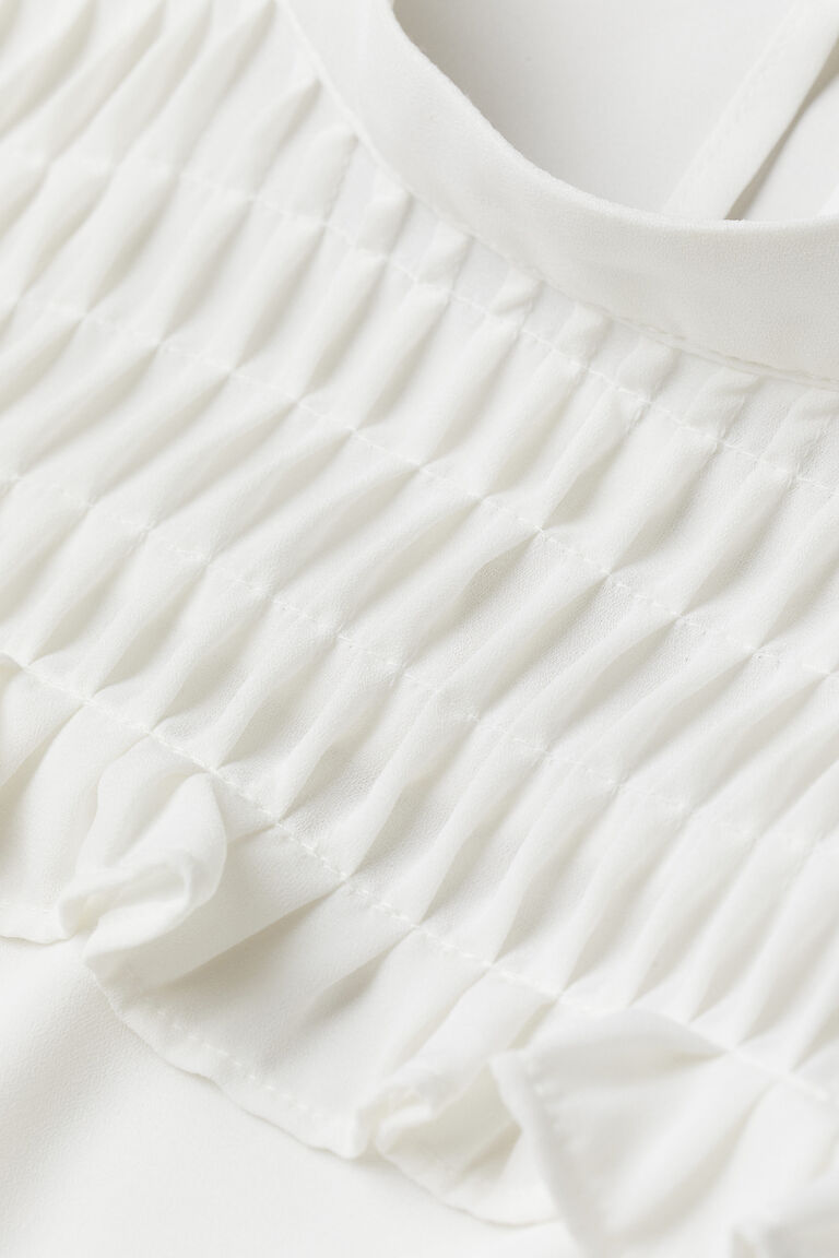 Smocking-detail blouse