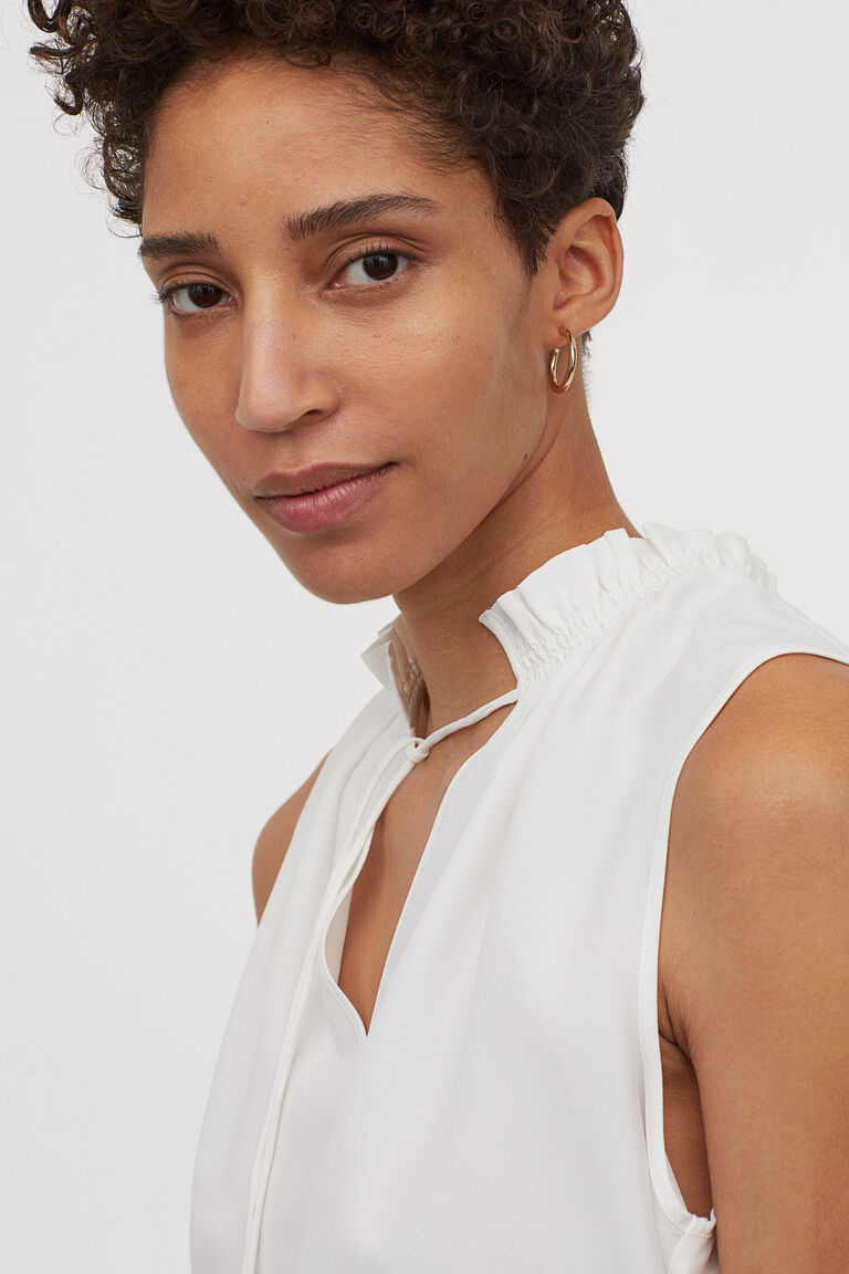 High-collared blouse