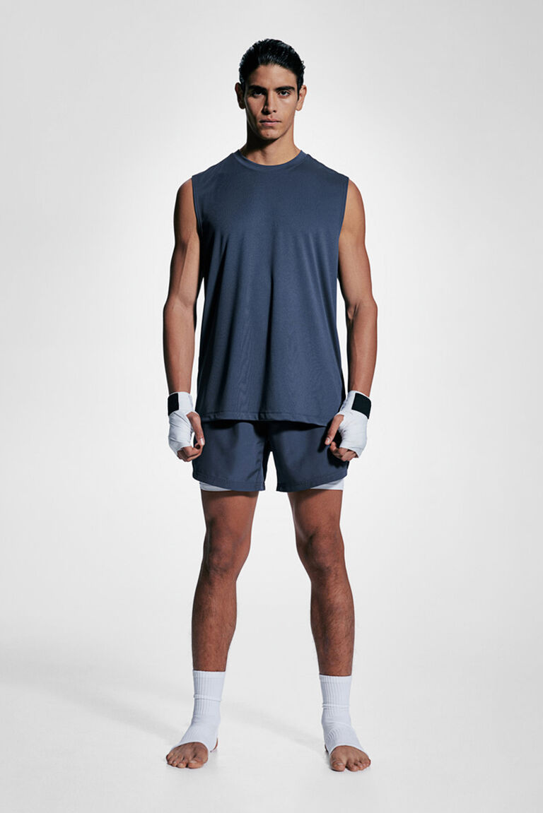 ซื้อ เสื้อกล้ามกีฬาผ้า DryMove™ ออนไลน์ สำหรับผู้ชาย | H&M Thailand