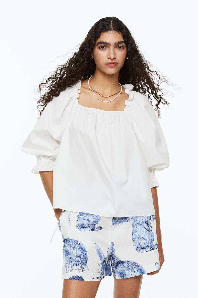 Frill-trimmed cotton blouse