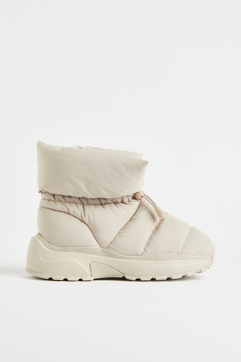 Padded trainer boots