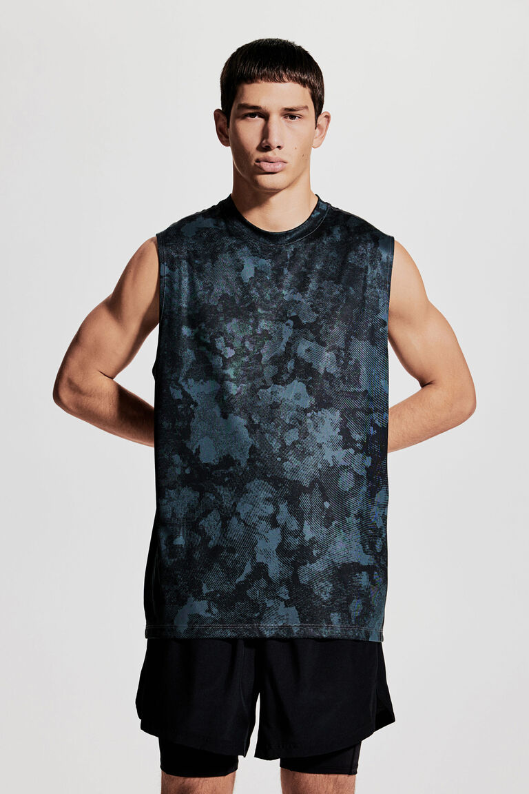 ซื้อ เสื้อกล้ามกีฬาผ้า DryMove™ ออนไลน์ สำหรับผู้ชาย | H&M Thailand