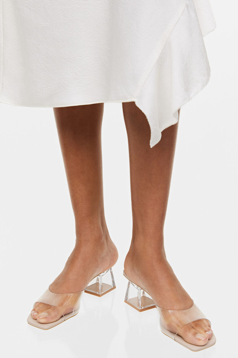 Transparent heeled mules