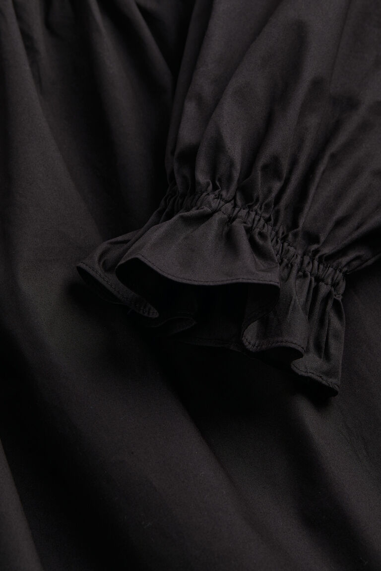 Frill-trimmed cotton blouse