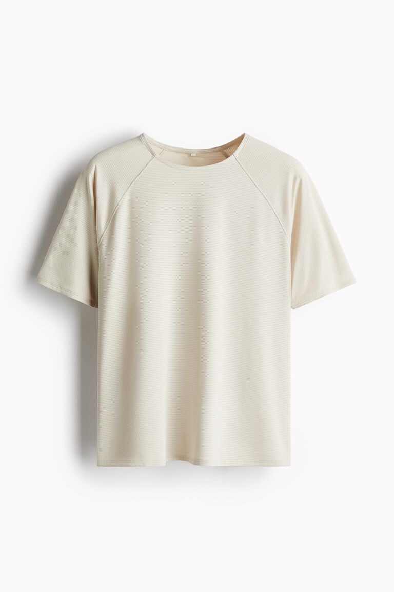 เสื้อกีฬาผ้า DryMove™ ซื้อชุดออกำลังกายผู้หญิง ออนไลน์ | H&M Thialnd