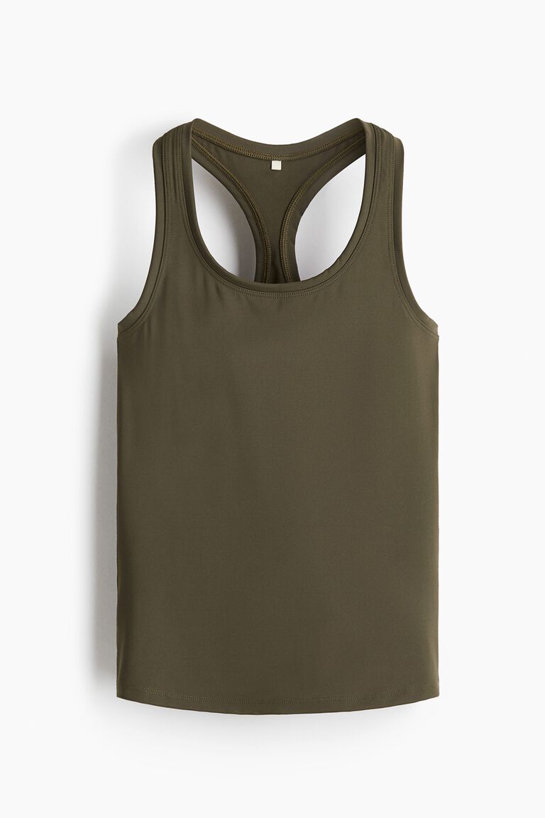 เสื้อท็อปกีฬา พร้อมเทคโนโลยี DryMove™ ซื้อชุดออกำลังกายผู้หญิง ออนไลน์ ...