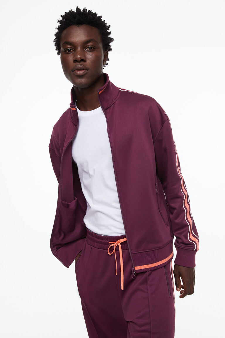Track jacket with side stripes