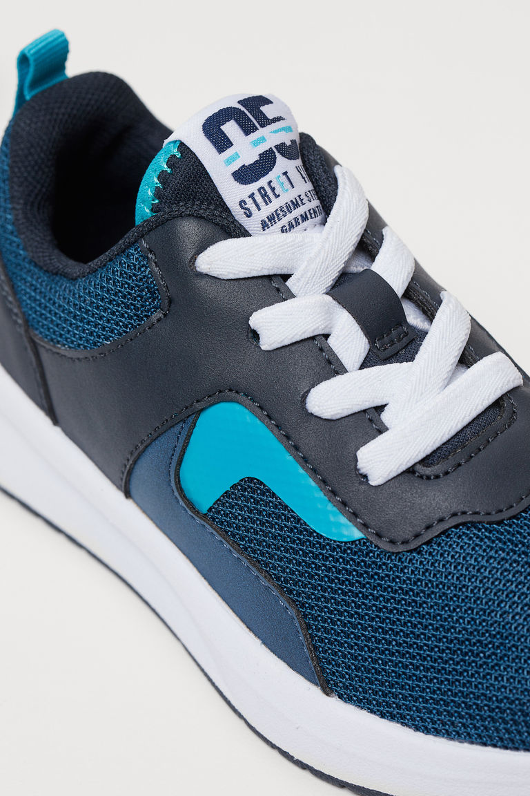 Elastic-laced trainers