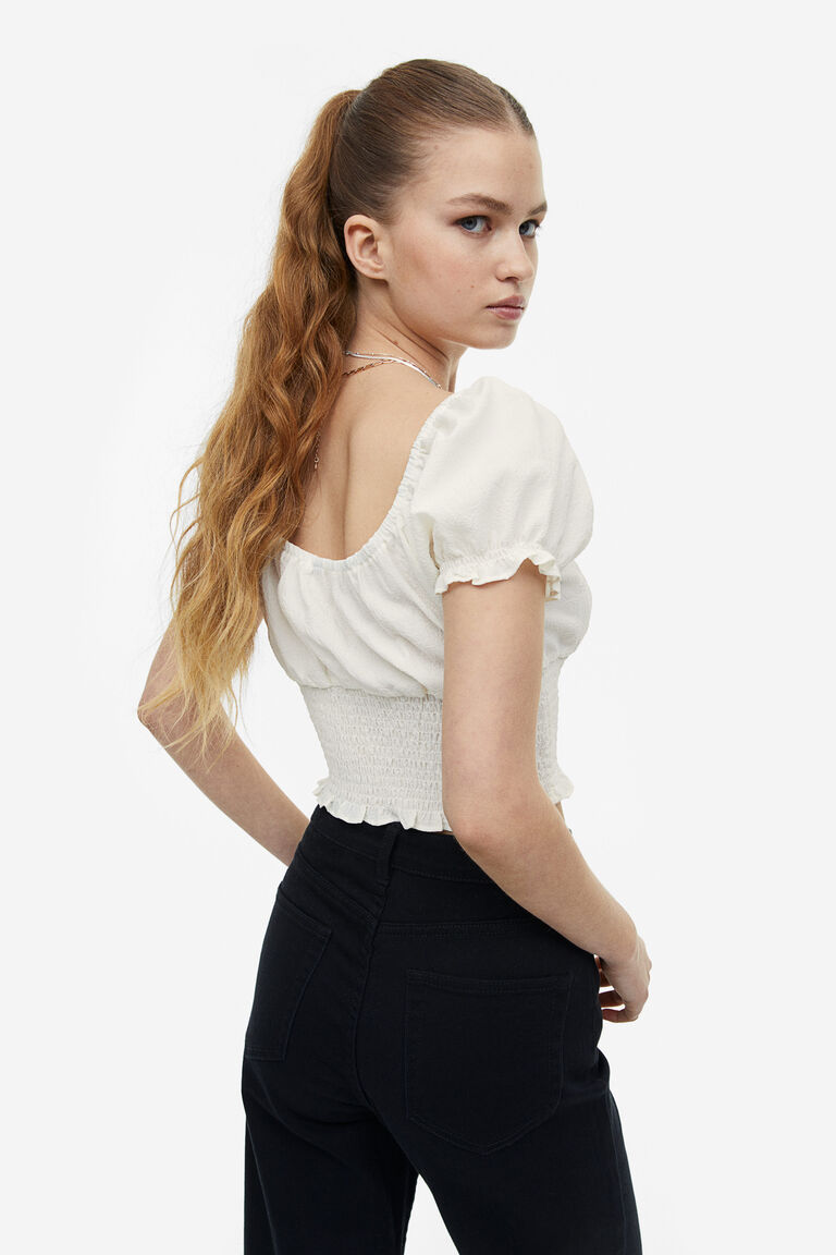 Puff-sleeved smocked blouse