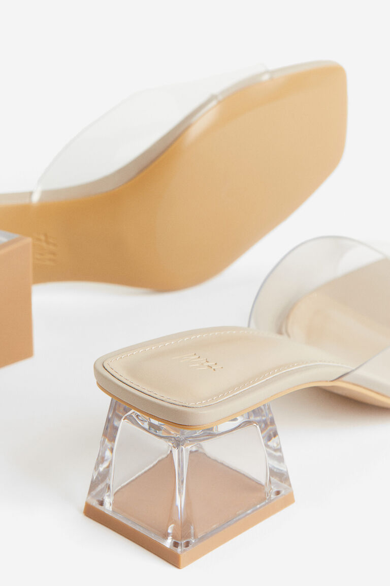 Transparent heeled mules