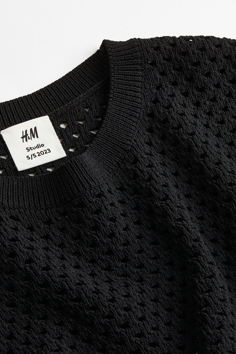 Oversized hole-knit vest top