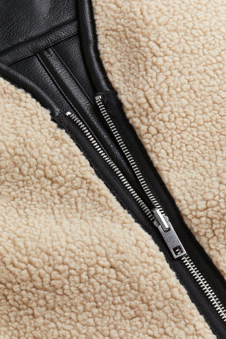 เสื้อกั๊กกันหนาวแบบสองด้านทรงเข้ารูป