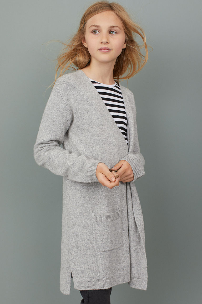 Knitted cardigan with a belt