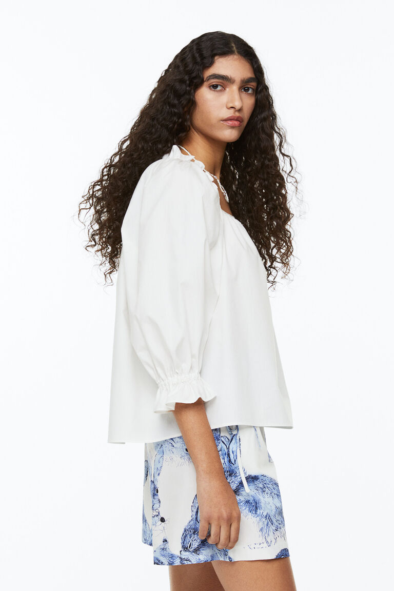 Frill-trimmed cotton blouse