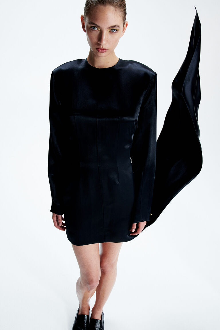 Draped-panel shoulder-pad dress