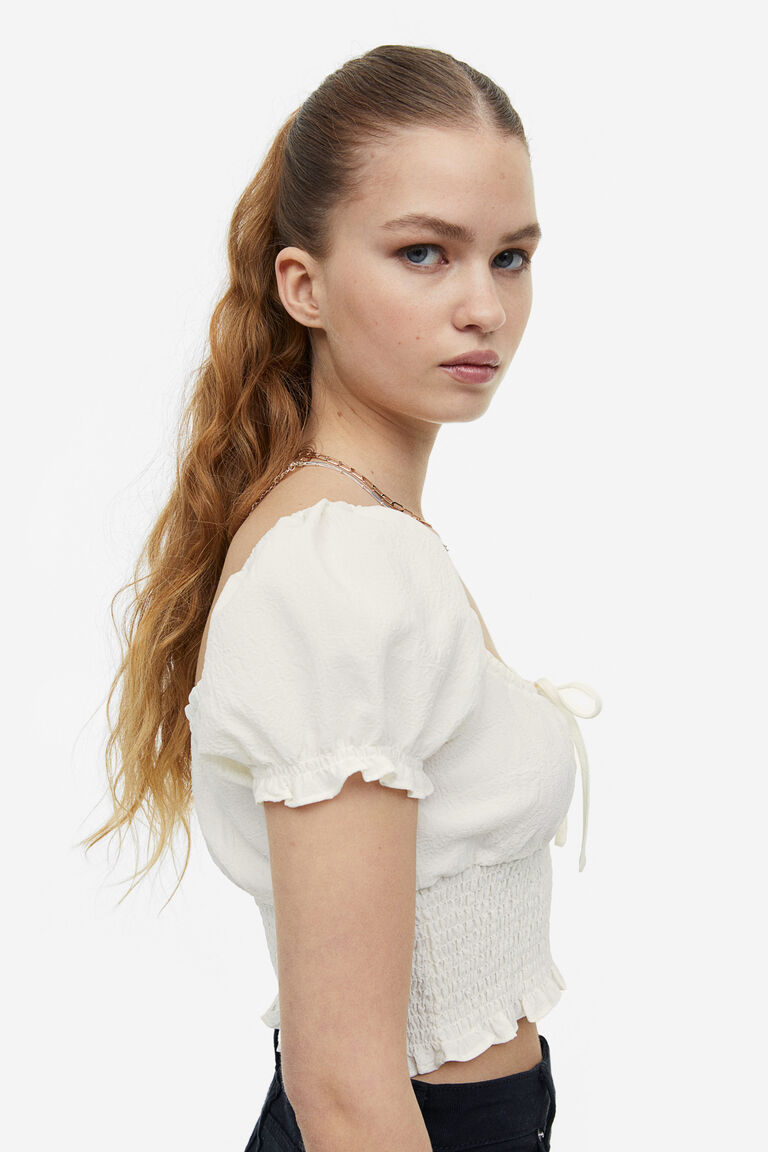 Puff-sleeved smocked blouse