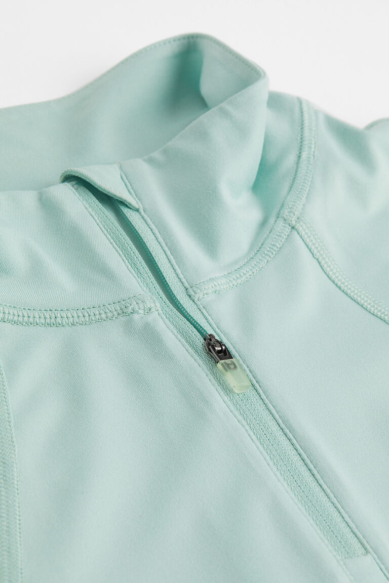 Zip-top sports top in DryMove™
