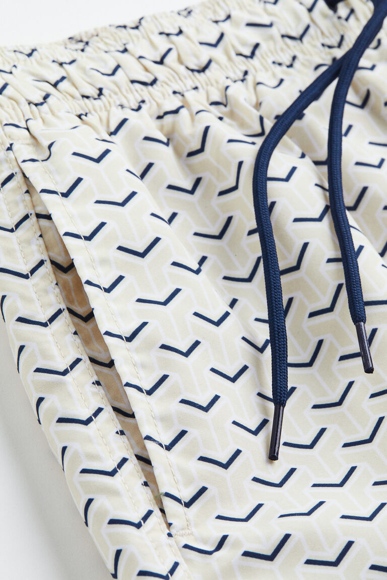 Patterned swim shorts