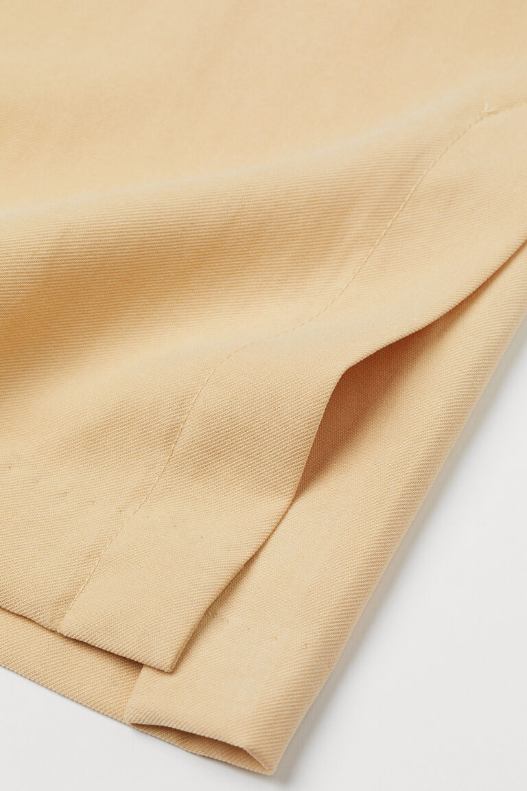 Wide side-slit trousers