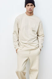 Loose Fit Long-sleeved sports top with DryMove™