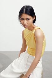 ซื้อ เสื้อกล้ามแต่งดีเทลบิดเกลียว สี ออนไลน์ สำหรับผู้หญิง | H&M Thailand